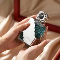 China 100ml Glass Perfume Bottles Unique Angled Rectangle Floral Cap Empty for sale