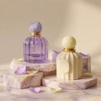 China Empty Perfume Bottles 100ml Ribbed Glass Cylinder Spray Ball Round Cap for sale