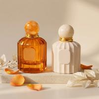 China Empty Perfume Bottles 100ml Ribbed Glass Cylinder Spray Ball Round Cap for sale