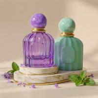China Empty Perfume Bottles 100ml Ribbed Glass Cylinder Spray Ball Round Cap for sale