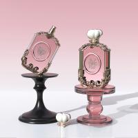 China Unique Perfume Bottles 100ml Glass Pink Metal Frame Pumpkin Cap Empty Spray Luxury for sale