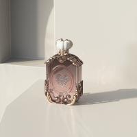 China Unique Perfume Bottles 100ml Glass Pink Metal Frame Pumpkin Cap Empty Spray Luxury for sale