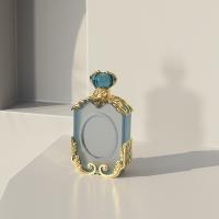 China Unique Perfume Bottles 100ml Glass Pink Metal Frame Pumpkin Cap Empty Spray Luxury for sale