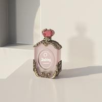 China Unique Perfume Bottles 100ml Glass Pink Metal Frame Pumpkin Cap Empty Spray Luxury for sale