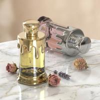 China 100ml Perfume Bottle Glass Unique Candle Shape Drip Cap Empty Spray Crimp Neck for sale