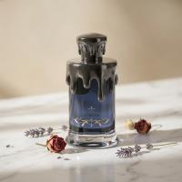 China 100ml Perfume Bottle Glass Unique Candle Shape Drip Cap Empty Spray Crimp Neck for sale