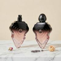 China 100ml Glass Perfume Bottle Empty Unique Irregular Shape Round Cap Crimp Neck for sale