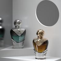 China 100ml Unique Perfume Bottles Empty Glass Spray Magnetic Cap Metal Wave Shape for sale
