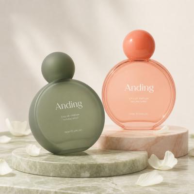 China 100ml Glass Perfume Bottles Round Empty Ball Cap Spray Crimp Neck for sale