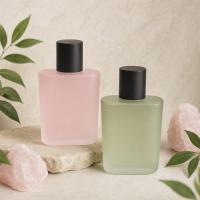 China 100ml Glass Perfume Bottles Cylinder Cap Spray Square Empty Crimp Neck for sale