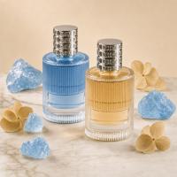 China Anding Stock Wholesale Bulk Luxury Pink Gold Premium Crimp Spray Custom Cylinder Empty Glass Perfume Bottle 100ml for sale