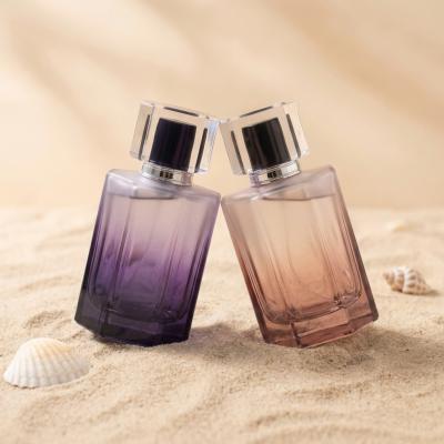 China Glass Perfume Bottles 100ml Geometric Empty Crimp Neck Faceted Cap Spray for sale