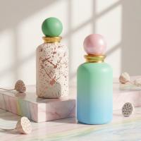 China Empty Glass Perfume Bottles 100ml Cylinder Crimp Neck Round Cap Spray for sale