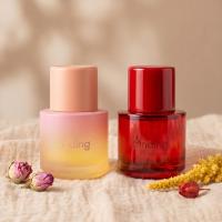 China Glass Perfume Bottles 50ml Cylinder Empty Plastic Cap Printing Luxury Design for sale