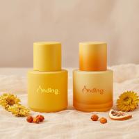 China Glass Perfume Bottles 50ml Cylinder Empty Plastic Cap Printing Luxury Design for sale