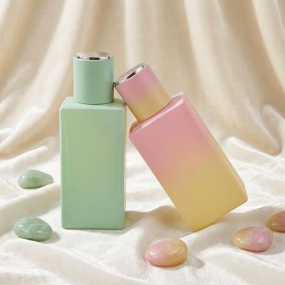 China 100ml Perfume Bottles Empty Glass Rectangle Crimp Spray Cylinder Magnetic Cap for sale