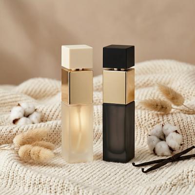 China 30ml Rectangle Glass Perfume Bottles Crimp Neck Plastic Square Cap for Perfume for sale