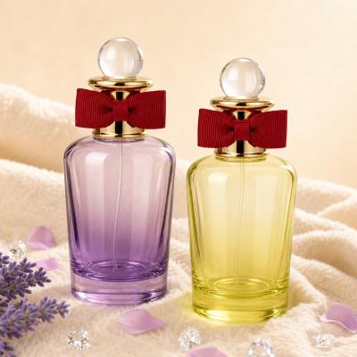 China 100ml Perfume Bottles Cylinder Glass Empty Spray Crimp Neck Round Cap for sale