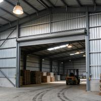 China Durable Steel Structure Warehouse Buildings Suitable For Agricultural Industrial And Commercial Storage Applications for sale