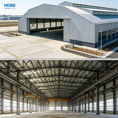 China Custom Large Span Steel Structure Aircraft Hangar Prefabricated Aviation Hangar For Jet Helicopter Maintenance & Parking for sale