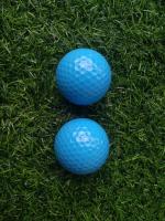 China Fluorescent Golf Balls Glow in UV Black Light 2.5 Inch Night Play for sale