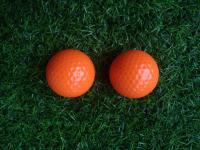 China Fluorescent Golf Balls Glow in UV Black Light 2.5 Inch Night Play for sale