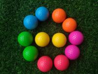 China Fluorescent Golf Balls Glow in UV Black Light 2.5 Inch Night Play for sale