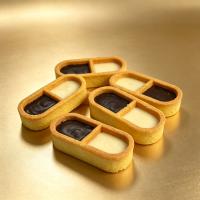 China Eye Catching Two Color Filling Dark Chocolate Yogurt Cookies Unique Capsule Shape for sale