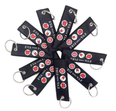 China Custom Woven Logo Embroidered Keyring Jet Tag 3x13cm Polyester Keychain for Motorcycle Car Anime for sale