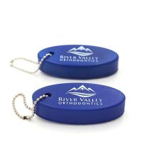 China Custom PU Foam Floating Rugby Ball Keychain 8cm x 3.5cm Promotional Gift for sale