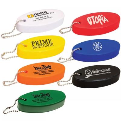China Custom PU Foam Floating Rugby Ball Keychain 8cm x 3.5cm Promotional Gift for sale