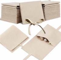 China Custom Debossed Microfiber Suede Jewelry Travel Pouch Bag 8x8cm with Flap Closure for sale