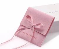 China Custom Debossed Microfiber Suede Jewelry Travel Pouch Bag 8x8cm with Flap Closure for sale