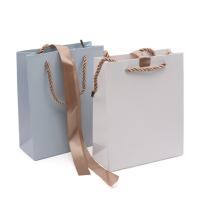 China Custom Printed White Cardboard Shopping Bag for Jewelry Clothing Shoes Packaging 250 GSM for sale