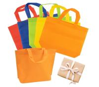 China Non Woven Party Favor Bags 10.3x13 Inches Reusable Tote Bags Bulk with Handles Eco Friendly Customizable for sale