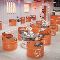 China Customized Industrial Oil Drum Table Chair Set Orange 2 Seats for Cafe Bar for sale