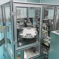 China Desiccant Cap Filling Machine Driven By Servo Equipment Has High Operating Rate Not Easy To Be Damaged for sale