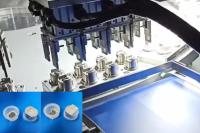 China High Precision And Qualified Rate Euro Cap Assembly Machine For Automatic Assembly Of Easy Peel Foil Caps For IV Infusion Soft Bags And Bottles for sale