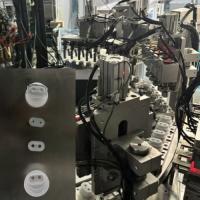 China High Precision And Qualified Rate Euro Cap Assembly Machine For Automatic Assembly Of Easy Peel Foil Caps For IV Infusion Soft Bags And Bottles for sale
