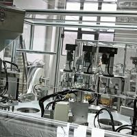 China Automatic Filling Machine For Desiccant Cap High Filling Accuracy Turntable Type Operation for sale