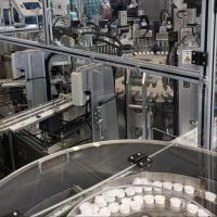 China Index motion Heli cap assembling machine, customised to meet customer requirements with high flexibility. for sale