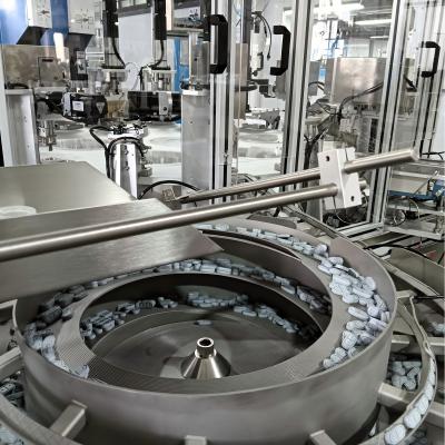 China Non-standard Automated Laminating Cap Assembly Machine With Flat Film Surface And Good Sealing for sale