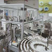 China Customizable Milk Paper Bottle Cap Assembly Machine For Automatic Heli Cover Capping Machine for sale