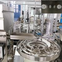 China Euro Cap Assembly Machine for Automatic Assembly of Easy Peel Foil Caps for IV Infusion Soft Bags and Bottles for sale
