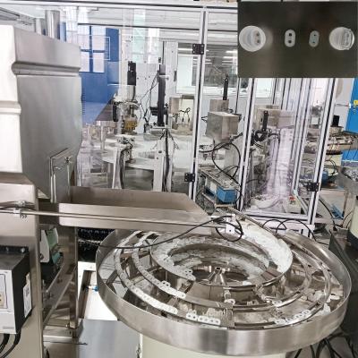 China Euro Cap Assembly Machine for Automatic Assembly of Easy Peel Foil Caps for IV Infusion Soft Bags and Bottles for sale