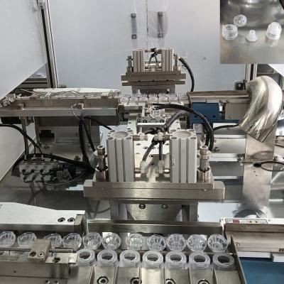 China High-Speed Daily Necessities Assembly Machine for Flip Top Caps Soy Sauce Caps for sale