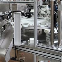 China Automated Infusion Film Cap Assembly Machine Made Of Stainless Steel Not Easy To Rust for sale
