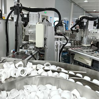 China Turntable Type Non-standard Automated Milk Cap Assembly Machine With Thick Material Not Easy To Be Damaged for sale