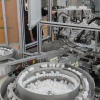 China Automatic Desiccant Cap Assembly Machine with 1500-8500pcs/hr Speed 220V/50Hz Power and 0.5-0.7MPa Air Pressure for sale