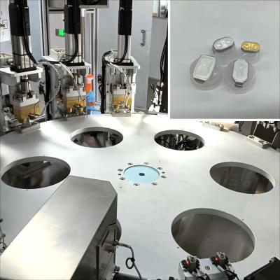 China Automatic Assembly Machine For Infusion Film Caps With Automatic Mould Punching Mechanism High Efficiency for sale